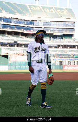 Athletics' Lawrence Butler walks to the dugout before a baseball game ...