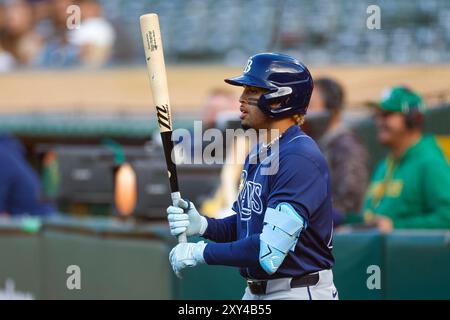 Tampa Bay Rays' Christopher Morel, right, celebrates in the dugout ...