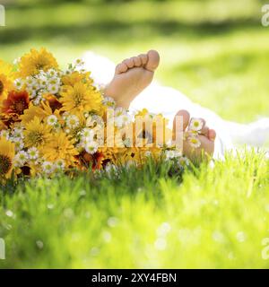 bare feet on spring grass and flowers Stock Photo - Alamy