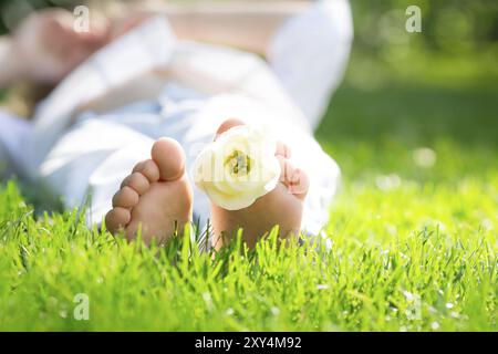 bare feet on spring grass and flowers Stock Photo - Alamy