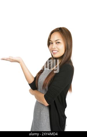 Side profile of gorgeous Asian woman in black sweater with light brown ...