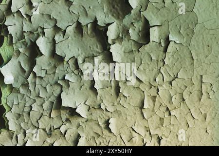 A surface with an old cracked paint splitting large pieces Stock Photo ...