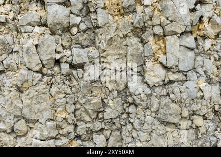Textured stone background Rubble ballast in natural form in the rock ...