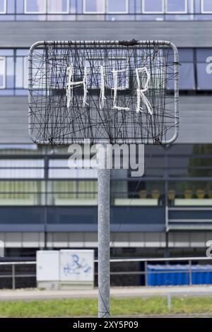 Traffic sign with spider web Stock Photo - Alamy