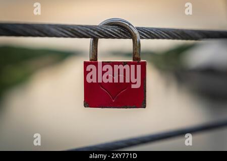 A Love lock on a gate with blurry background Stock Photo - Alamy