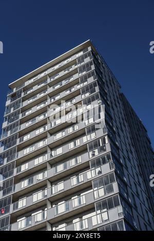 High-rise Apartment Building against blue sky. Modern, luxury apartment ...