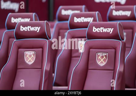 The dugout seats with West Ham United logo are seen inside the stadium ...
