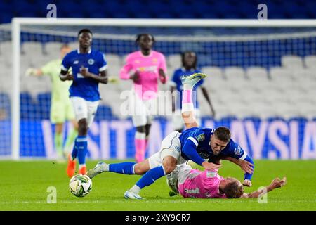 Cardiff City's Cian Ashford (left) and Derby County's Ryan Nyambe ...