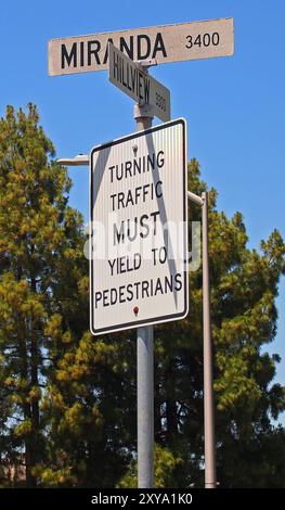 turning traffic must yield to pedestrians sign in California Stock ...