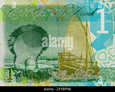 Traditional dhow (Bateel) and the oyster and pearl monument, portrait ...