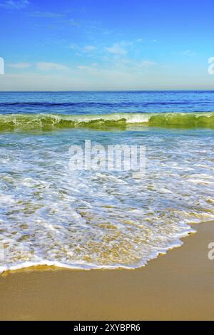 Water over sand in Cpacabana beach Stock Photo - Alamy