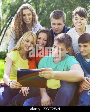 students with laptop, notebooks and tablet pc Stock Photo - Alamy