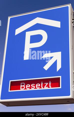 Parking garage sign occupied Stock Photo - Alamy