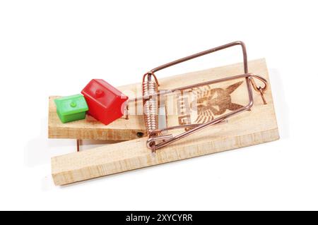 Mausefalle als Symbol. Mousetrap with worldwide as a symbol on a white ...