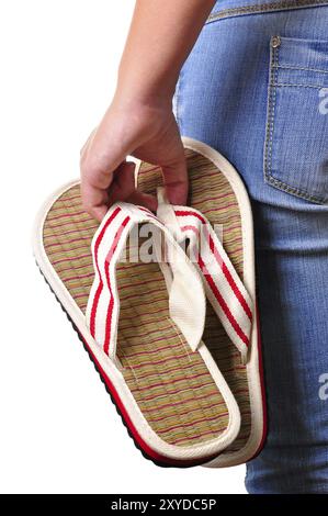 Girl holding sandals on the first day of vacations. Isolated Stock ...