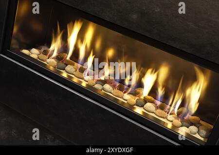 Closeup shot of a gas fire pit with white flowers in the background ...