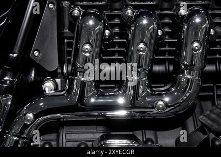 Detailed closeup view of powerful motorcycle engine featuring shiny ...