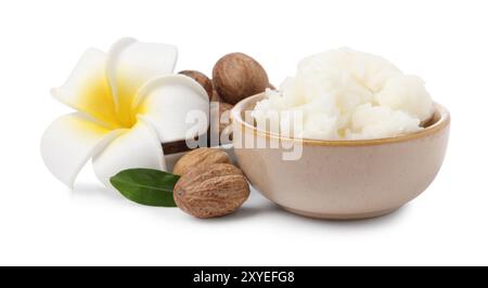 Shea butter in bowl, flower and nuts isolated on white, top view Stock ...