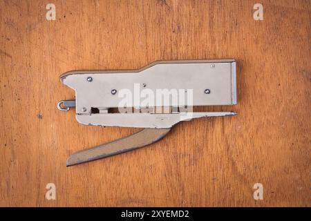 Old used metallic stapler still life Stock Photo - Alamy