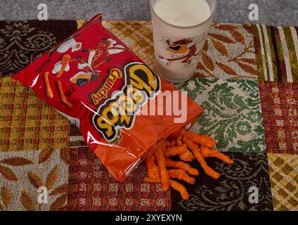 Cheetos crunchy with a glass of milk. Charles Elmer Doolin invented ...