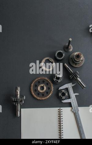 The gear set is placed on the workbench of a team of factory mechanical ...