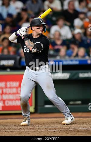 Chicago White Sox catcher Korey Lee warms up in the bullpen before a ...