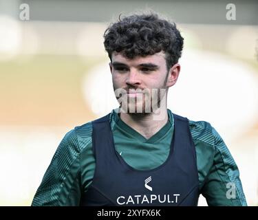 Ben Clark of The New Saints warms up ahead of the UEFA Champions League ...