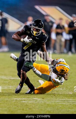 North Dakota State Bison linebacker Donovan Woolen (1) and teammates ...