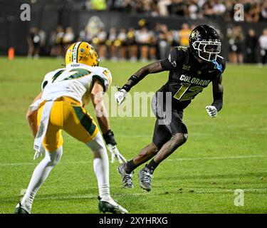 Colorado wide receiver Travis Hunter takes part in passing drills ...