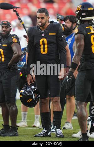 Washington Commanders quarterback Marcus Mariota (8) scores a touchdown ...