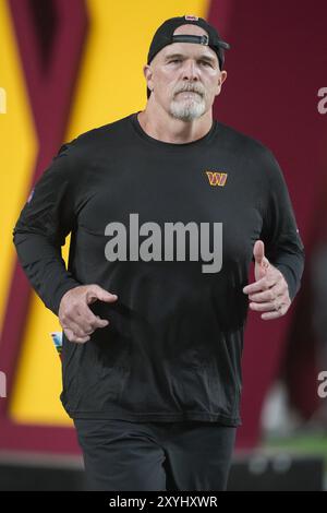 Washington Commanders head coach Dan Quinn speaks during a press ...