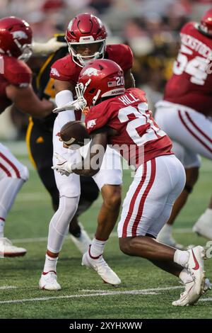 Arkansas running back Rodney Hill (1) carries against LSU safety ...