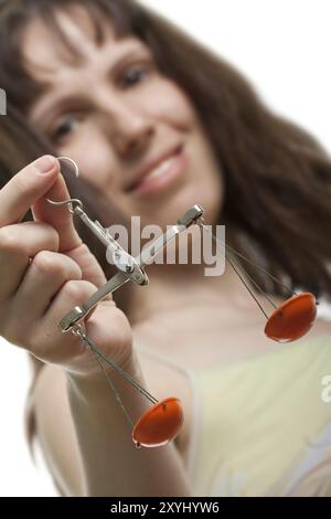 Women hand holding balance measuring weight scale Stock Photo - Alamy