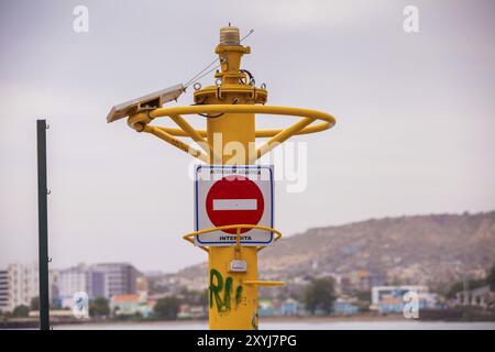 Yellow mast with traffic sign Stock Photo - Alamy
