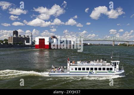 Ferryboat crossing cargo ship, Old Port, Montreal, Province of Quebec ...