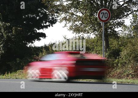 Speeding in front of a 70 km/h sign Stock Photo - Alamy