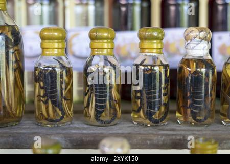 Choum, rice liquor, rice wine with pickled scorpions and snakes for ...