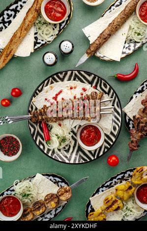 Barbecue on a skewer. Uzbek cuisine Stock Photo - Alamy