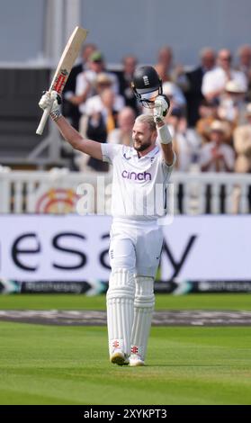 England's Gus Atkinson celebrates a century during day one of the ...