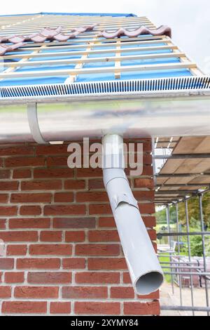 Rain gutters and pipes for drainage of rainwater from the roof Stock ...