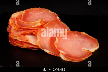 Spanish Lomo air dried pork loin meat slices with olives and cream ...