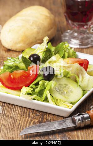 small salad with black olives Stock Photo - Alamy