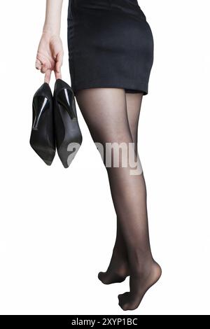 Beautiful female legs in pantyhose and shoes Stock Photo - Alamy