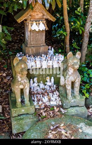 Statues of foxes at Jozan Inari Jinja, a Shinto shrine famous for Inari ...