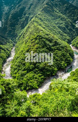 Iya River and lush forests in the Iya Valley, a scenic area in ...