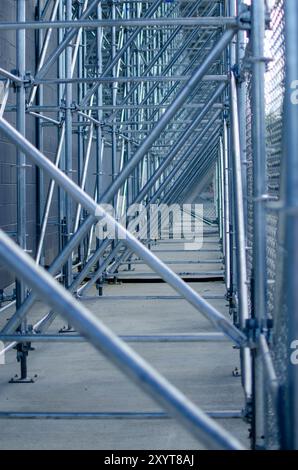 Architectural detail. Installation of metal structure outside. Metal ...