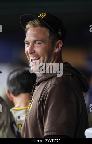 San Diego Padres' Jason Adam follows through on a pitch against the Los ...