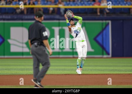 San Diego Padres shortstop Xander Bogaerts, front left, catches ...
