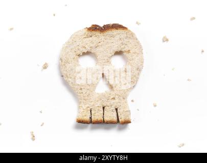 Skull made of bread isolated on white background Stock Photo - Alamy