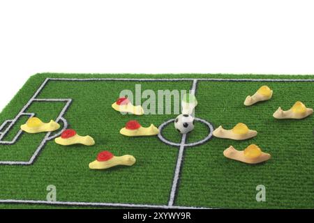 Snails playing football in front of a white background Stock Photo - Alamy